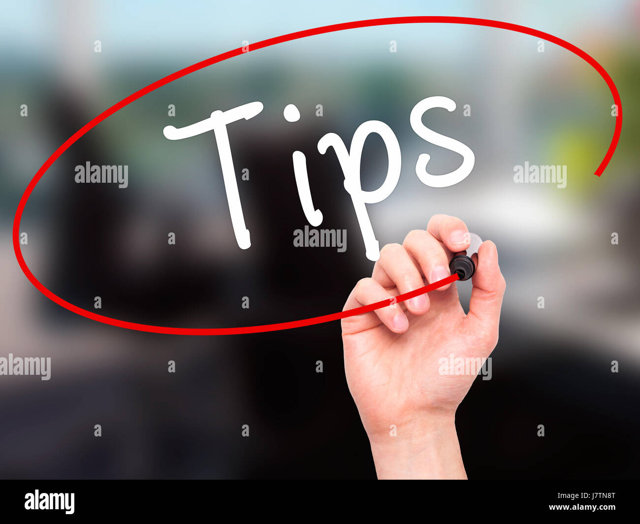 Man Hand writing Tips with black marker on visual screen. Isolated on ...
