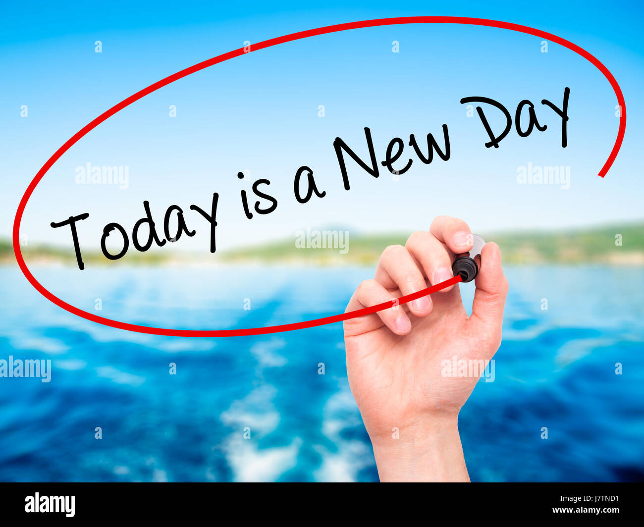 Man Hand writing Today is a New Day with black marker on visual screen ...