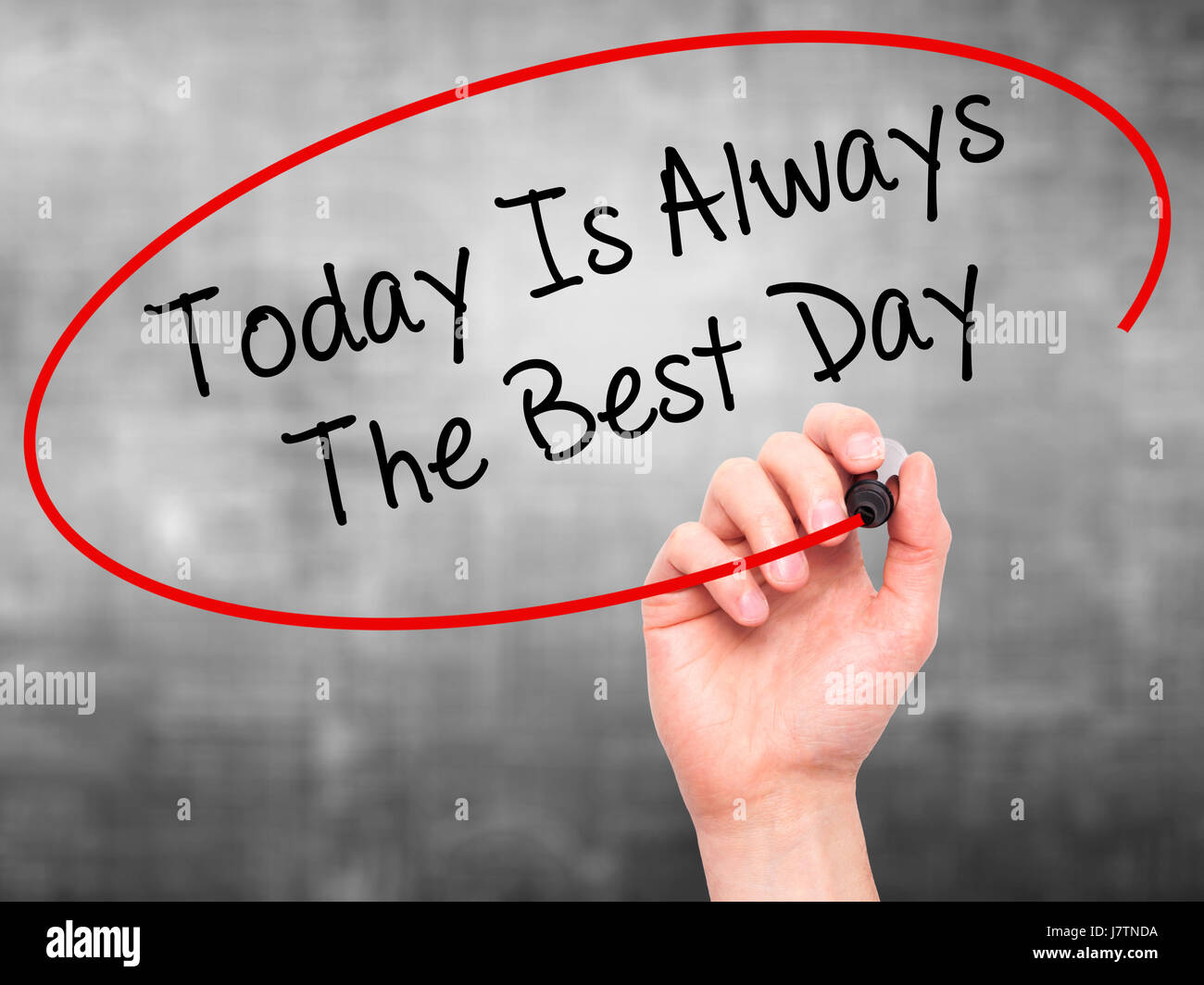 Man Hand writing Today Is Always The Best Day with black marker on ...