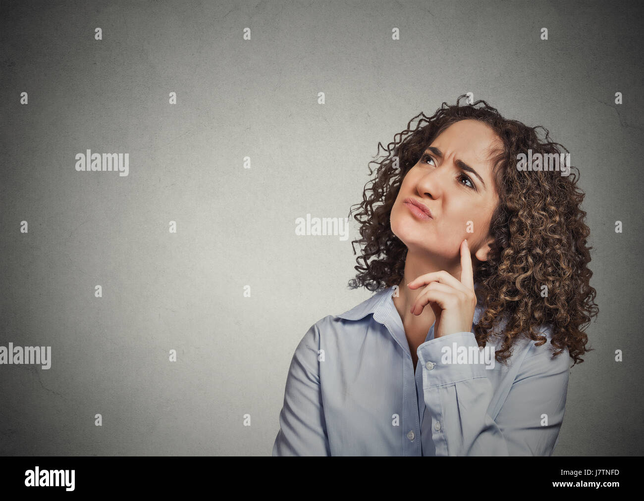 Closeup portrait grumpy annoyed unhappy young woman employee, customer ...