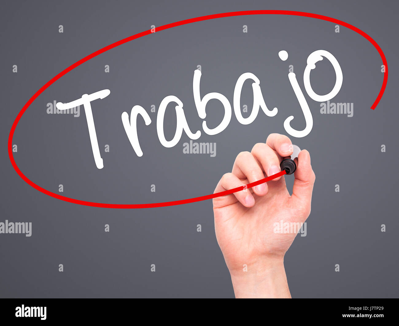 Man Hand writing Trabajo ( work in Spanish) with black marker on visual ...