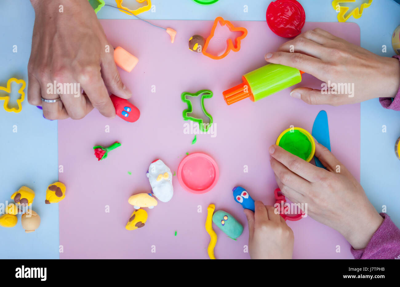 Children playing with hand made toys hi-res stock photography and ...