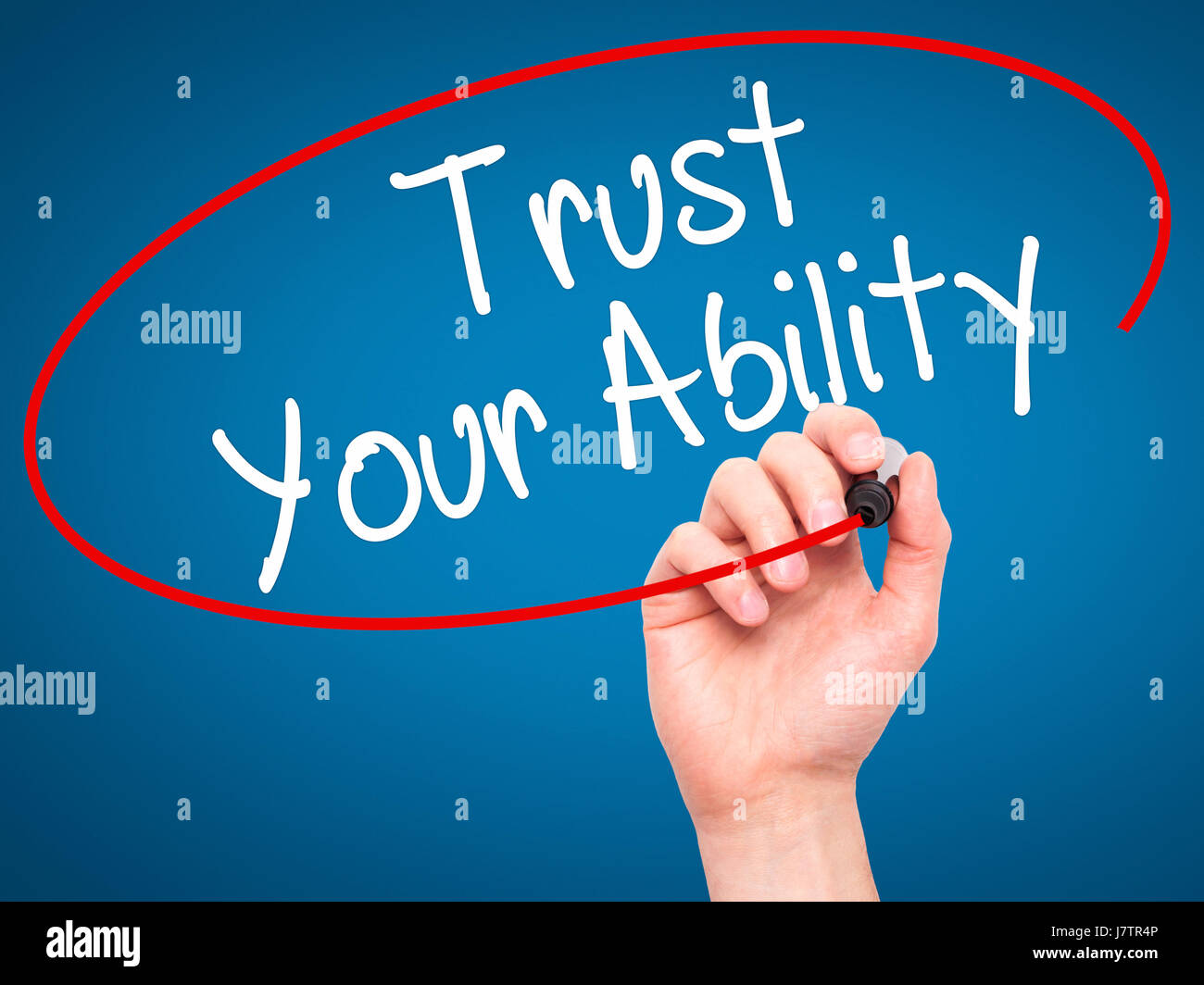 Man Hand writing Trust Your Ability with black marker on visual screen ...