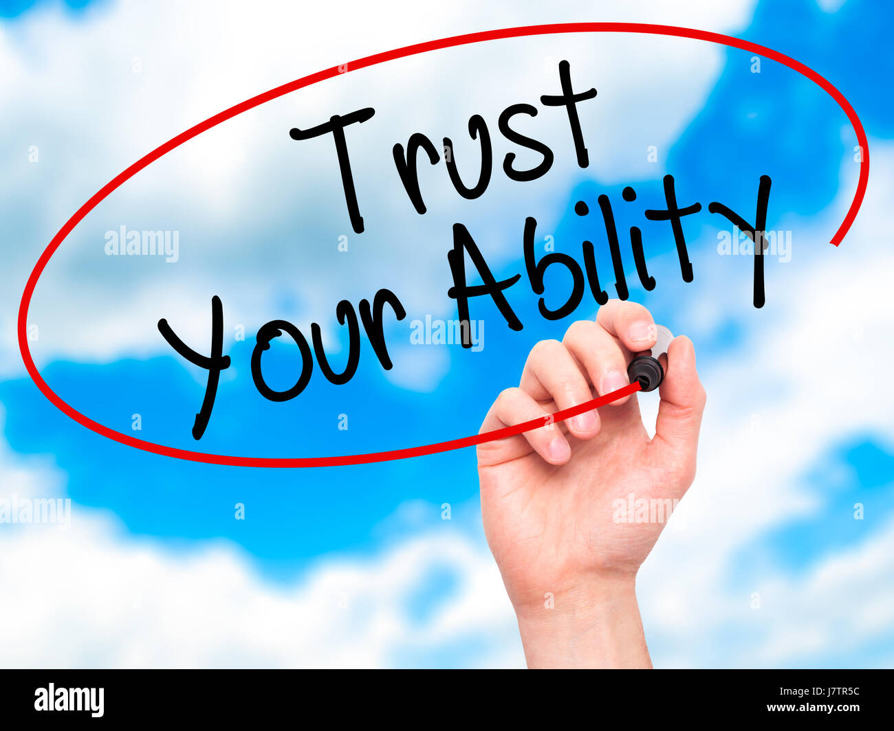 Man Hand writing Trust Your Ability with black marker on visual screen ...