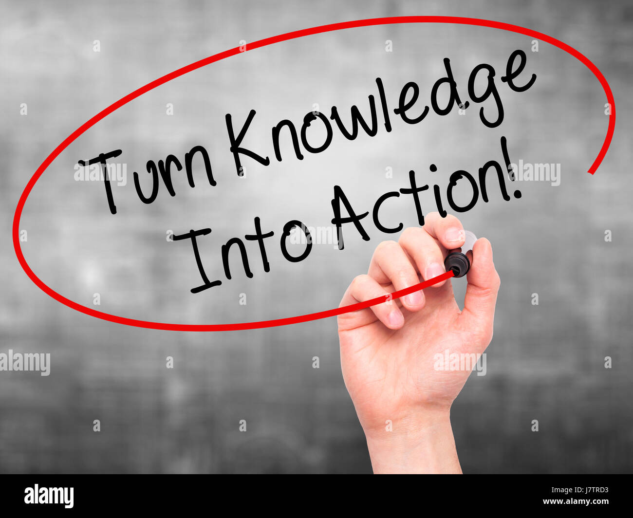 Man Hand writing Turn Knowledge Into Action! with black marker on ...