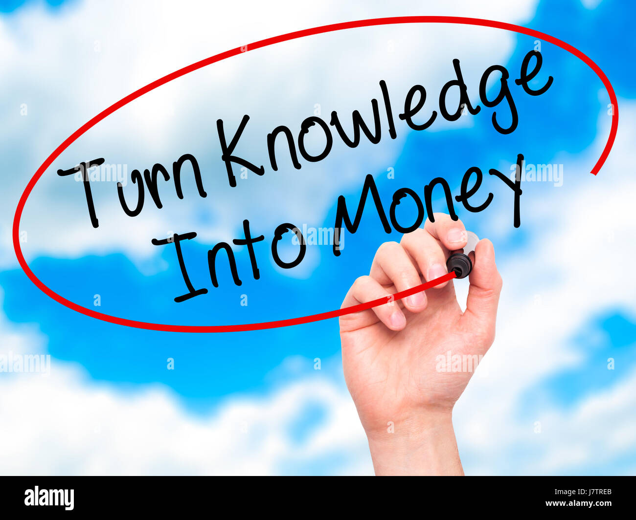 Man Hand writing Turn Knowledge Into Money with black marker on visual ...