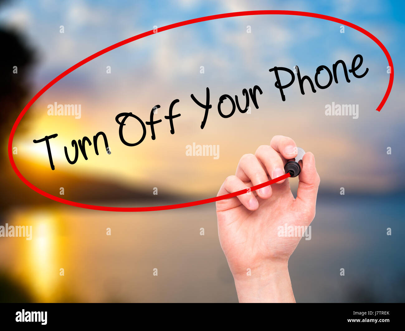 Man Hand writing Turn Off Your Phone with black marker on visual screen ...