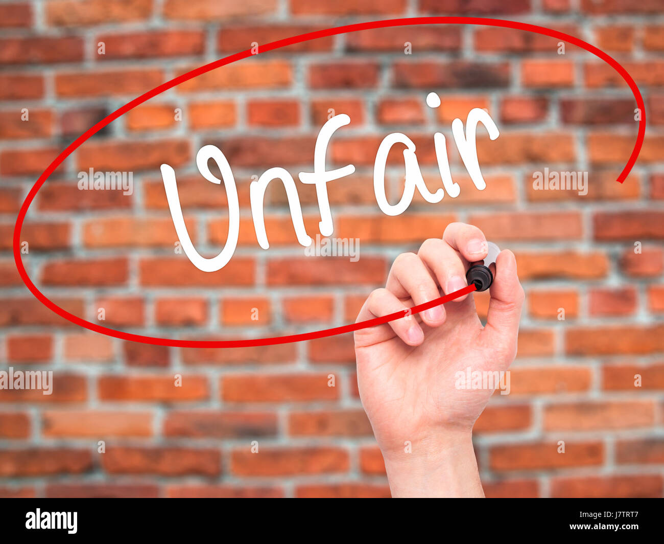 Man Hand writing Unfair with black marker on visual screen. Isolated on ...