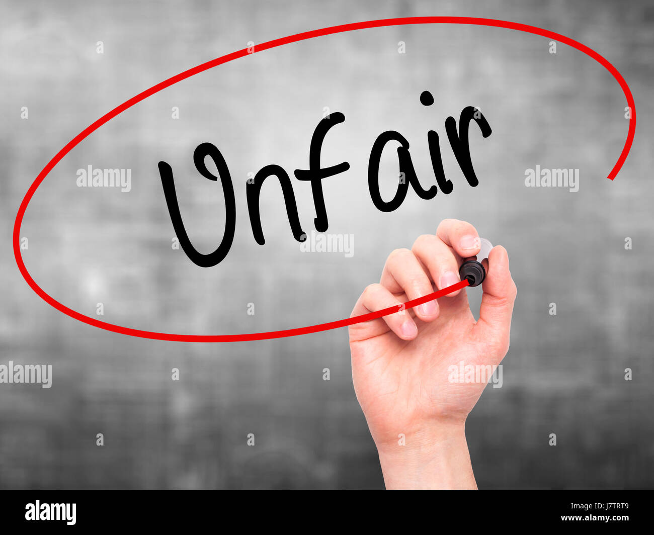 Man Hand writing Unfair with black marker on visual screen. Isolated on ...