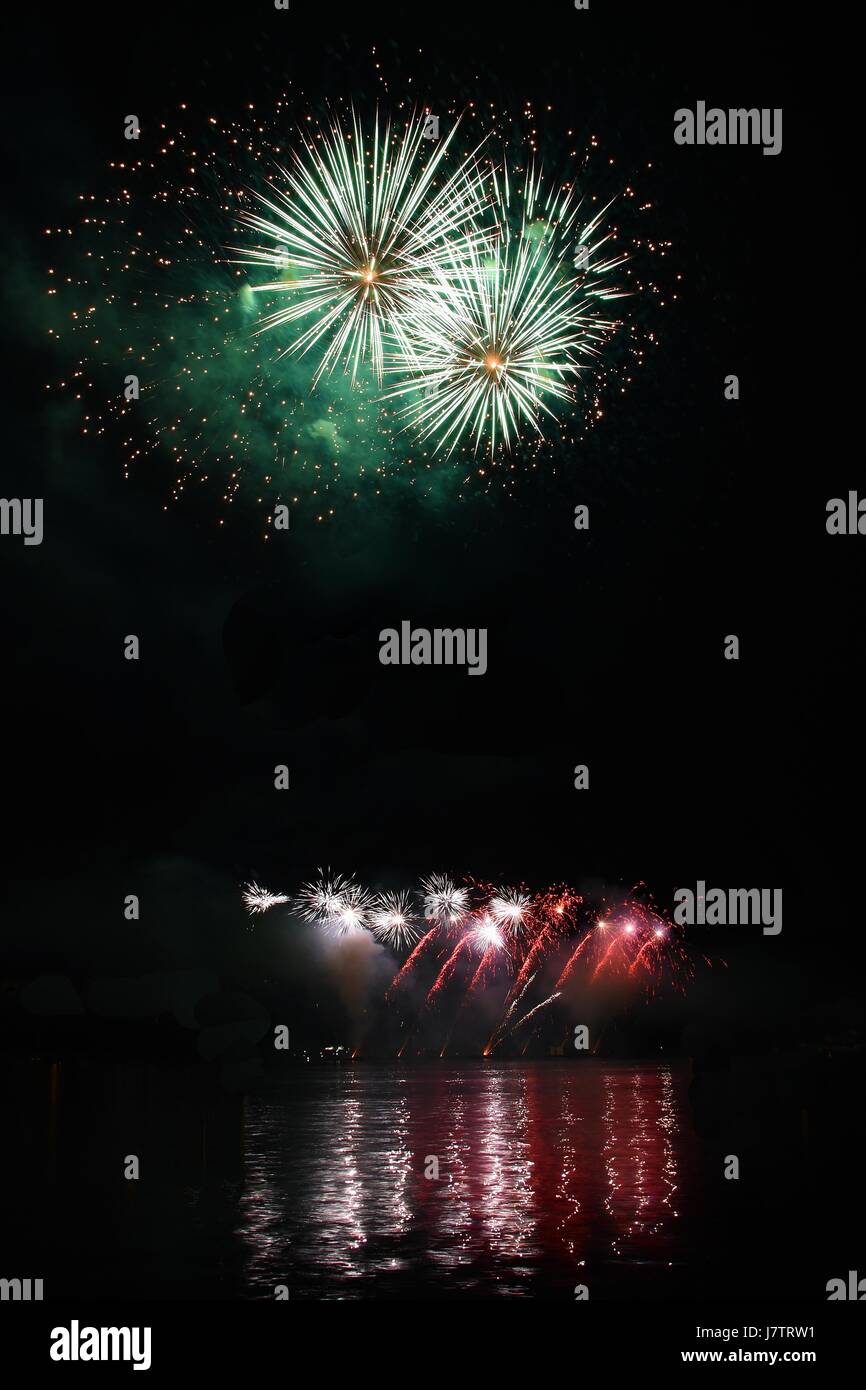 Beautiful colorful fireworks on water. Brno dam. International ...