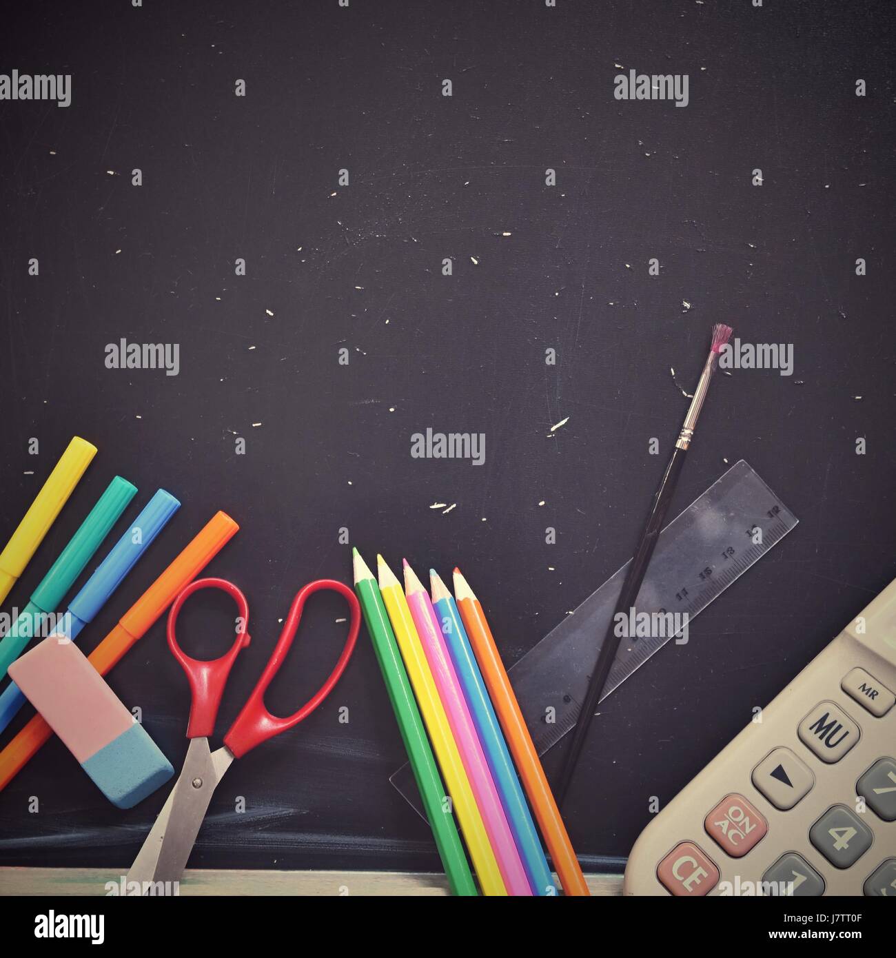 Background back to school. Blackboard with school aids Stock Photo - Alamy