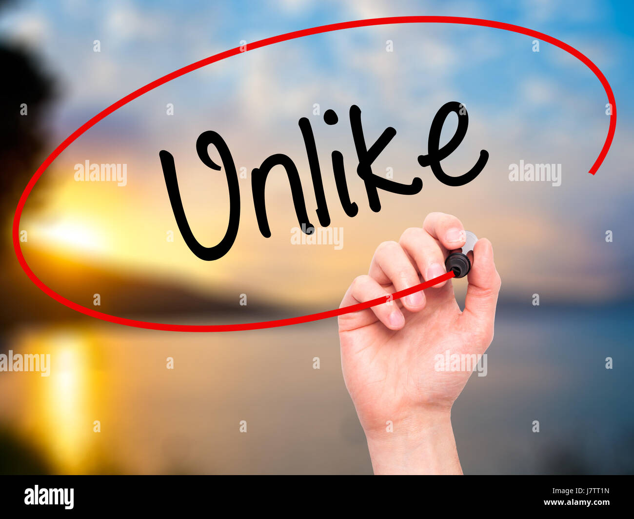 Man Hand writing Unlike with black marker on visual screen. Isolated on ...