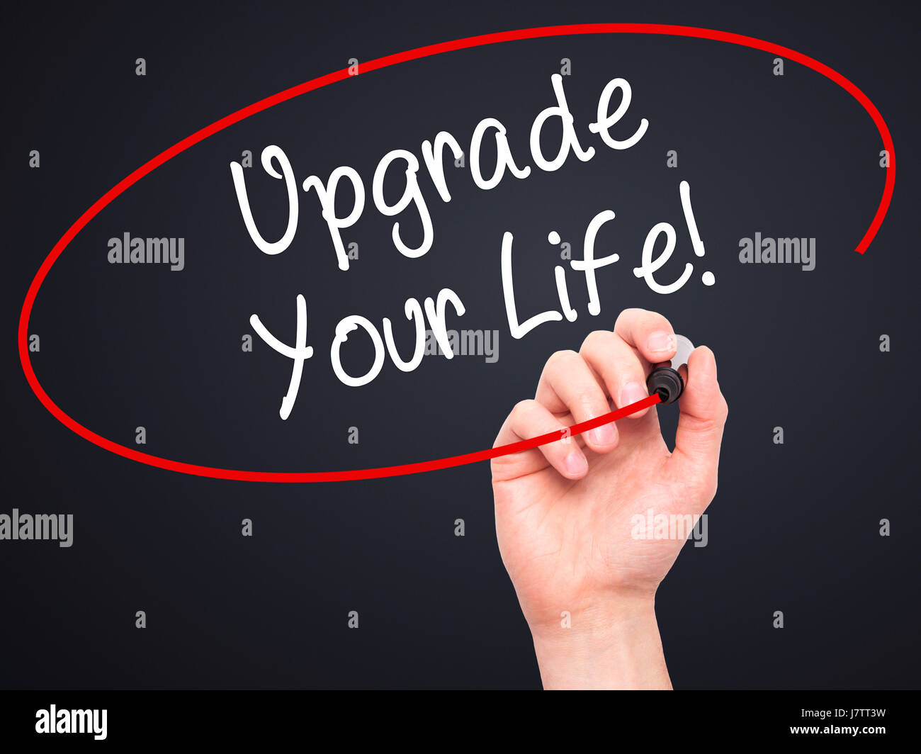 Man Hand writing Upgrade Your Life! with black marker on visual screen ...