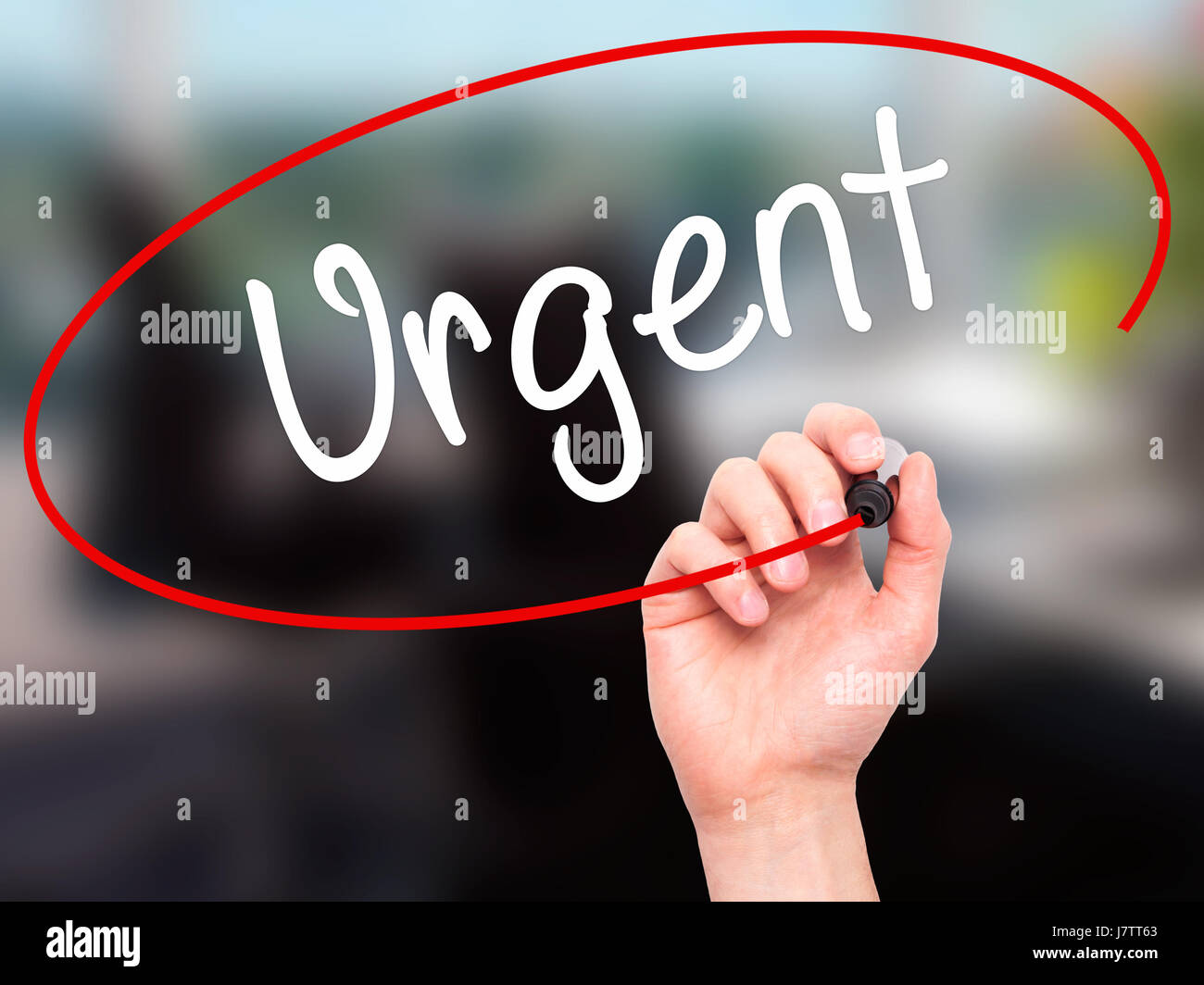 Man Hand writing Urgent with black marker on visual screen. Isolated on ...