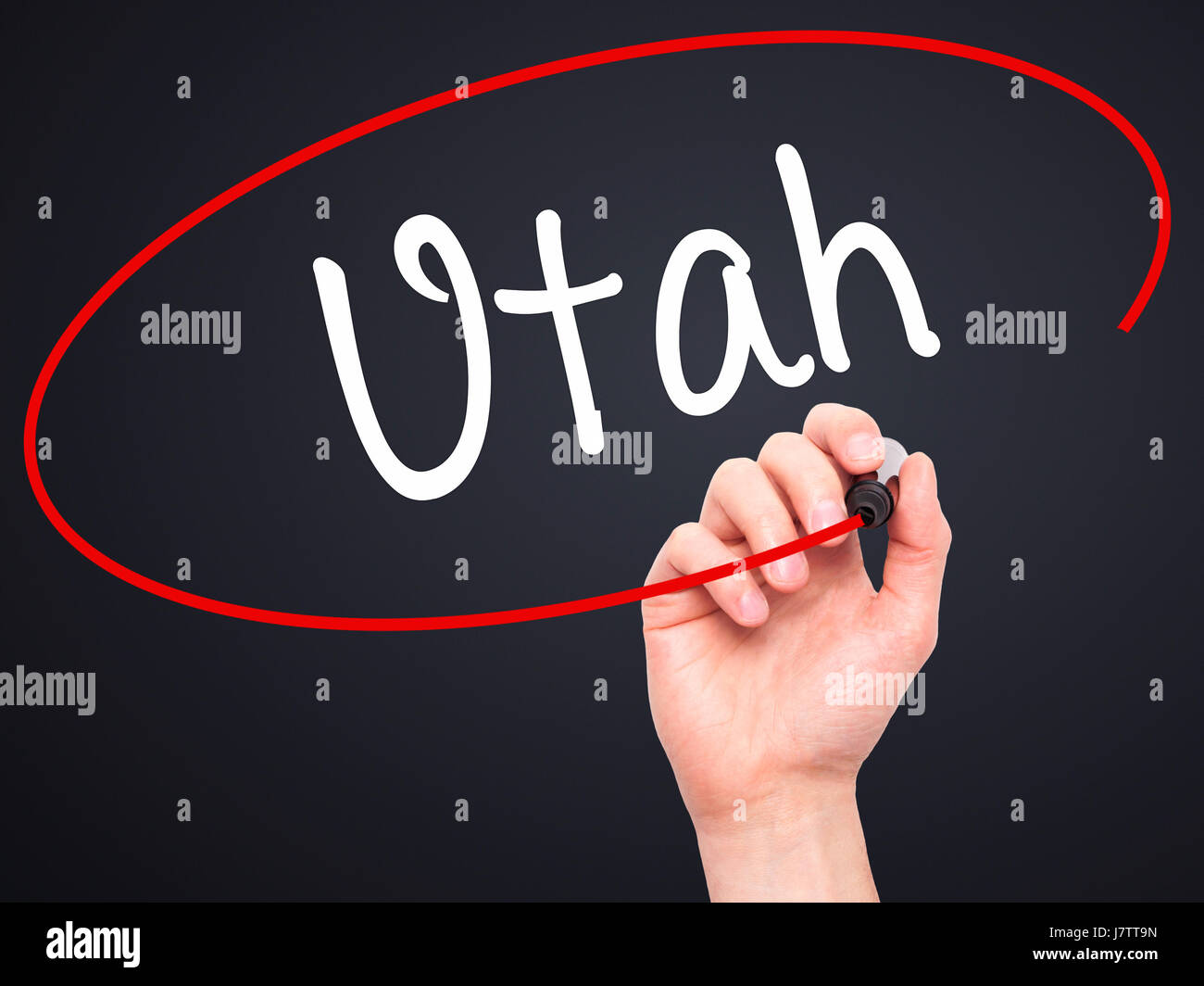 Man Hand writing Utah with black marker on visual screen. Isolated on ...