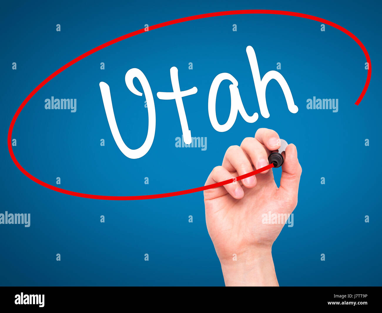 Man Hand writing Utah with black marker on visual screen. Isolated on ...