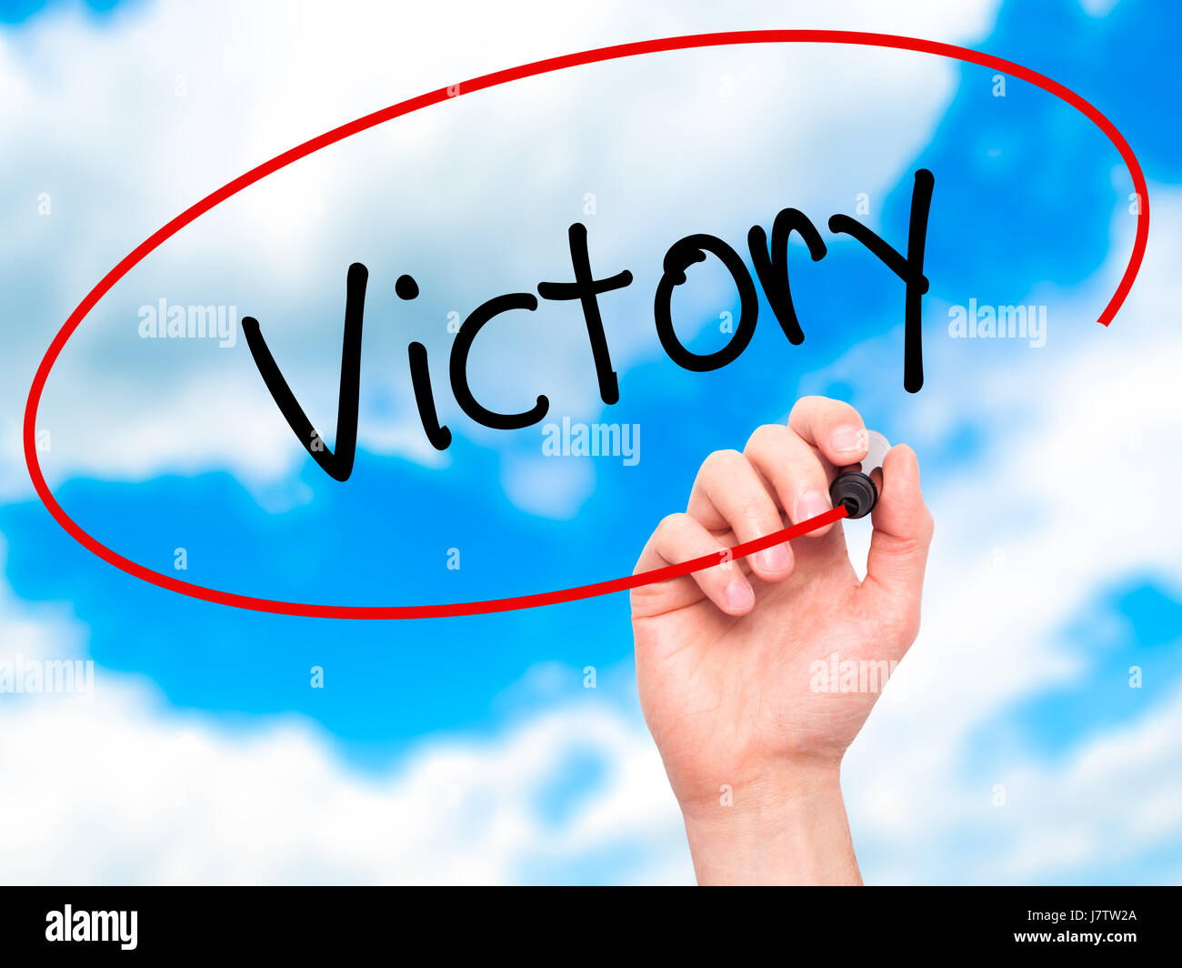 Man Hand writing Victory with black marker on visual screen. Isolated ...