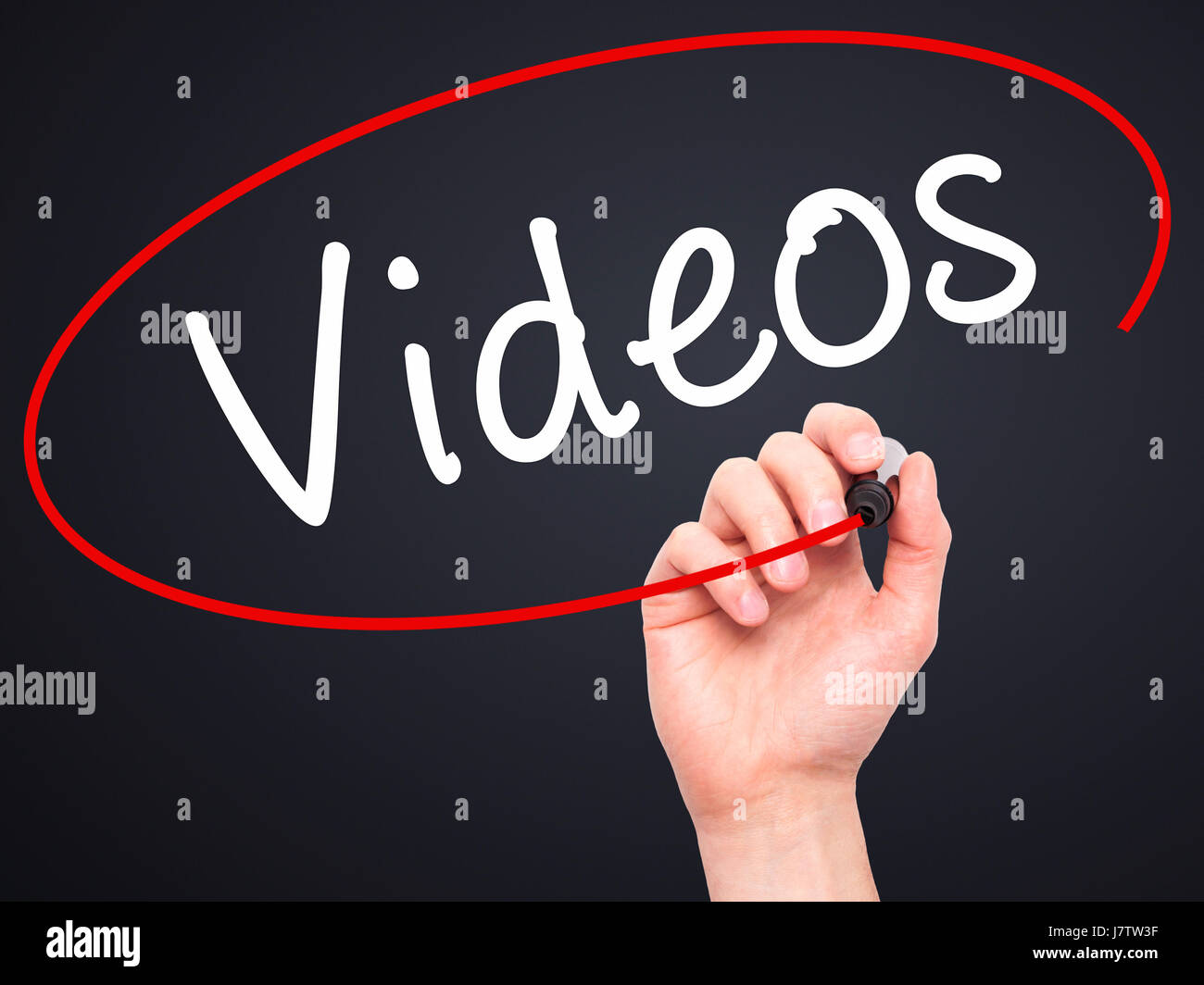 Man Hand writing Videos with black marker on visual screen. Isolated on ...