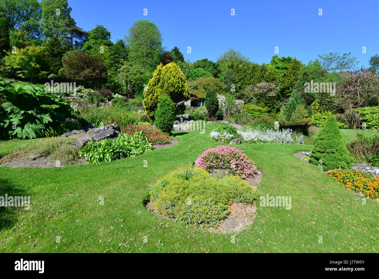 A public rock garden in Brighton, Sussex on a spring morning Stock ...