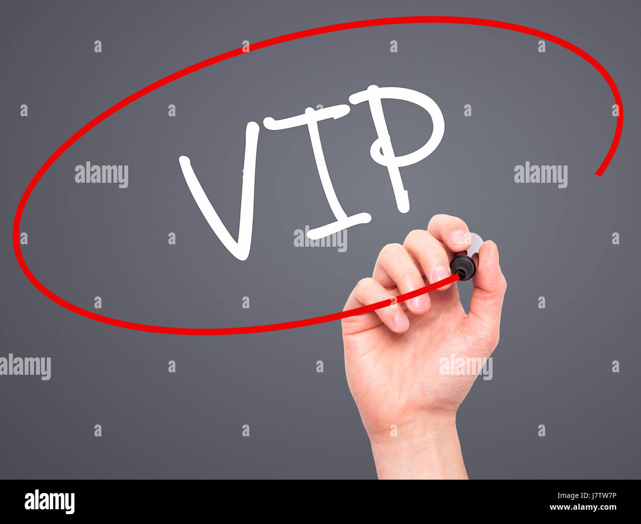 Man Hand writing VIP with black marker on visual screen. Isolated on ...