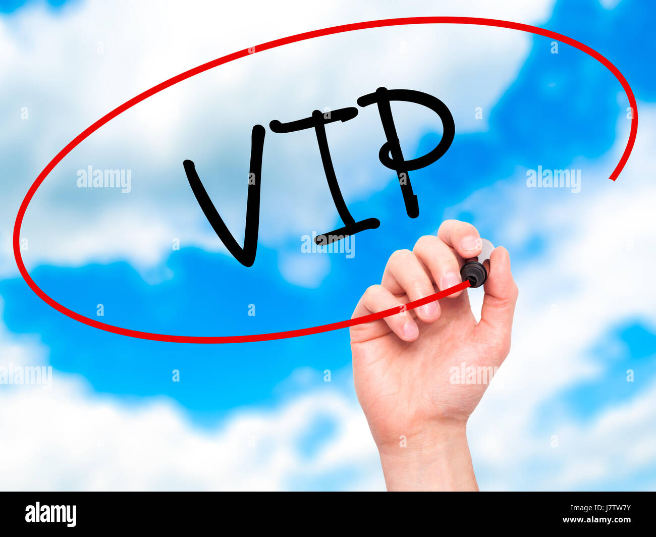 Man Hand writing VIP with black marker on visual screen. Isolated on ...