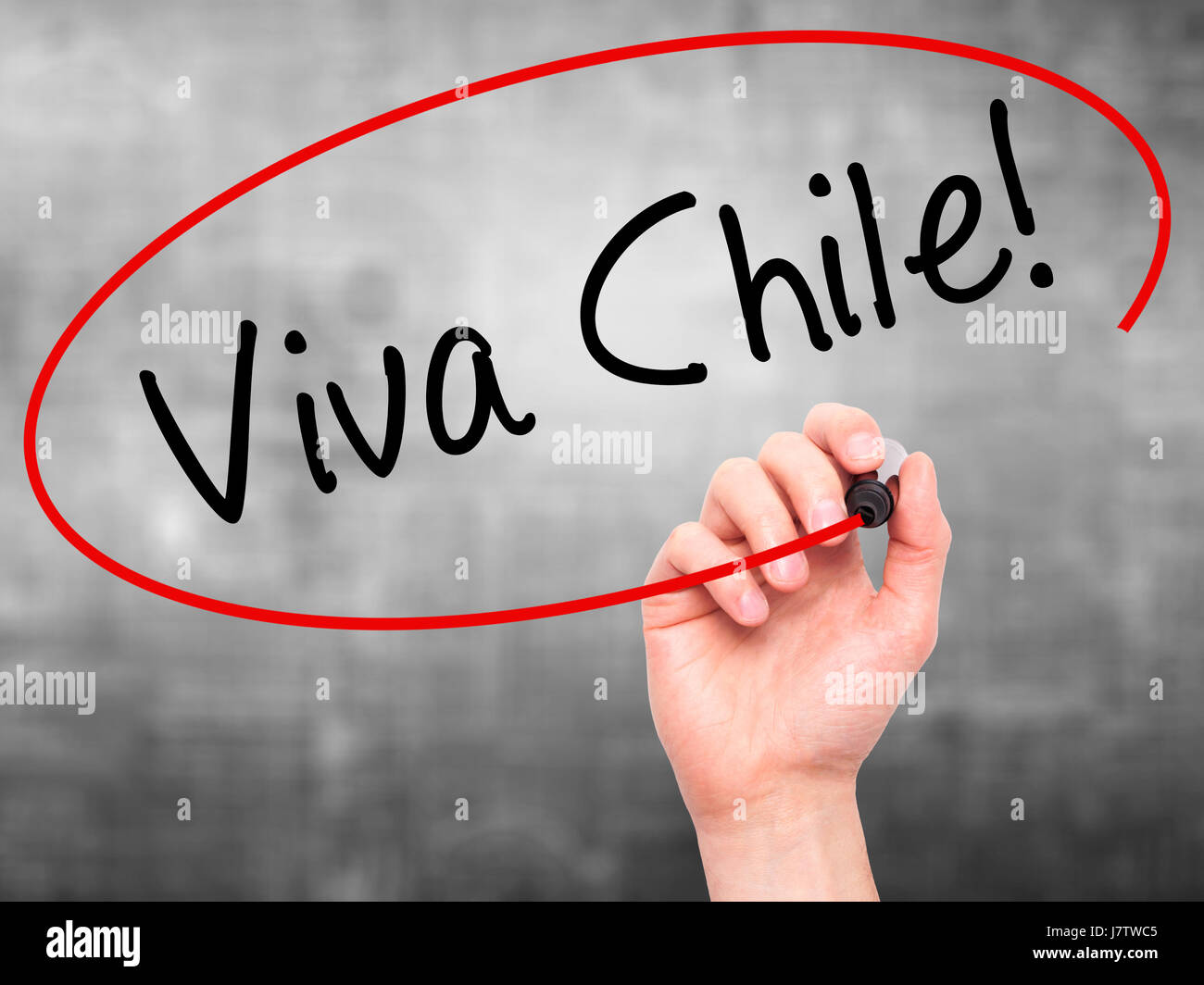 Man Hand writing Viva Chile! with black marker on visual screen ...
