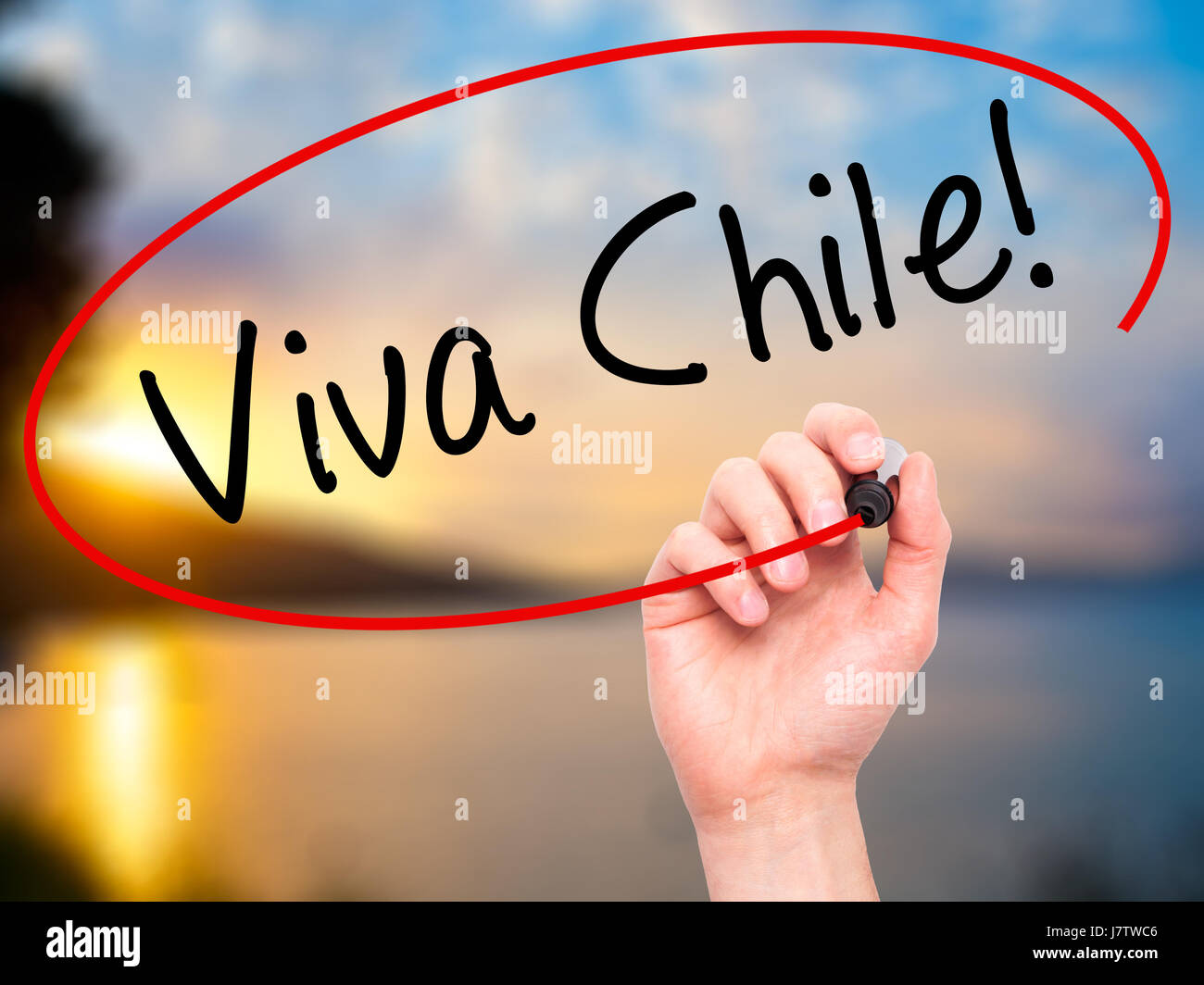 Man Hand writing Viva Chile! with black marker on visual screen ...
