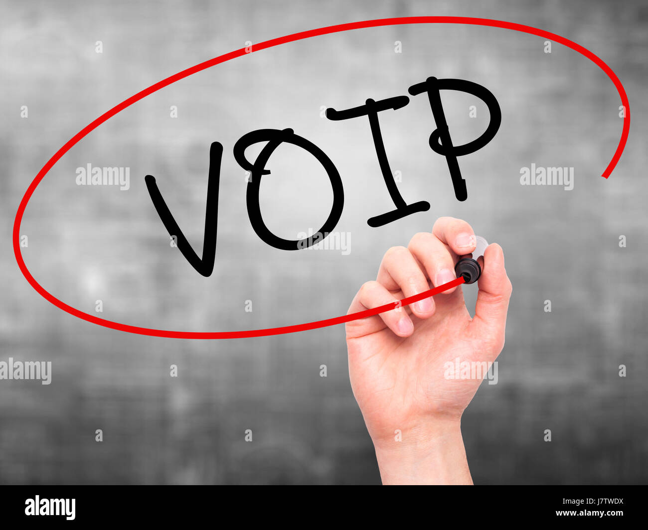 Man Hand writing VOIP with black marker on visual screen. Isolated on ...