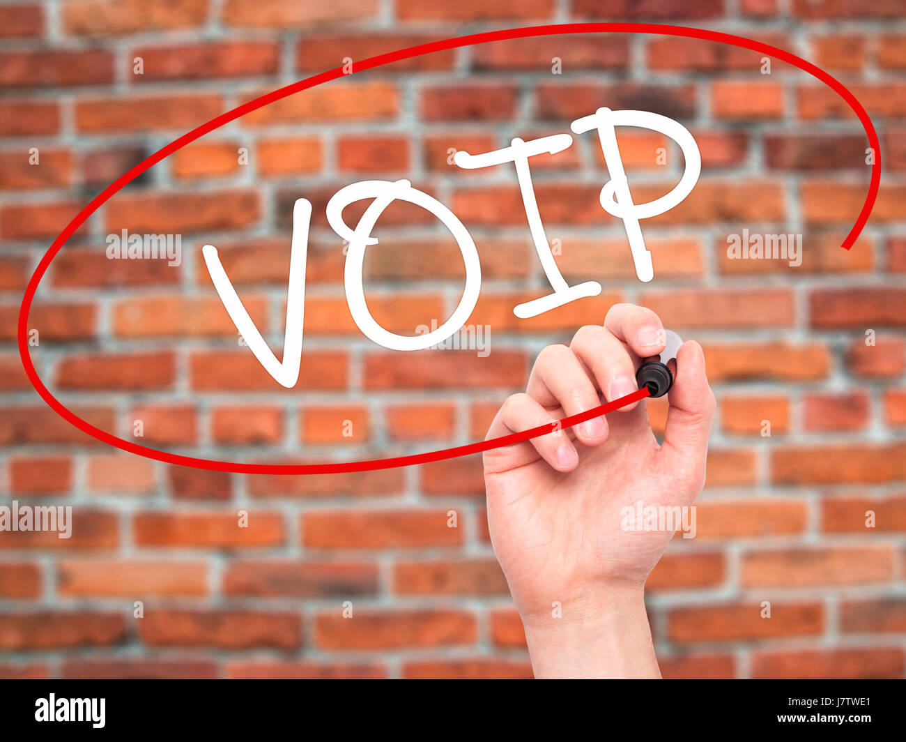 Man Hand writing VOIP with black marker on visual screen. Isolated on ...