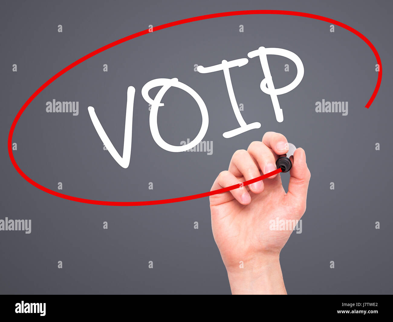Man Hand writing VOIP with black marker on visual screen. Isolated on ...