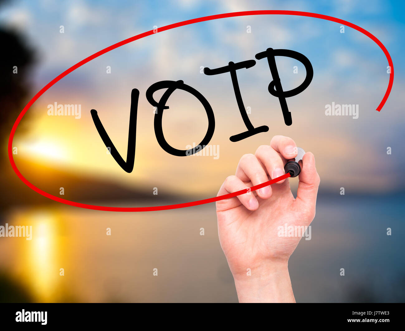Man Hand writing VOIP with black marker on visual screen. Isolated on ...