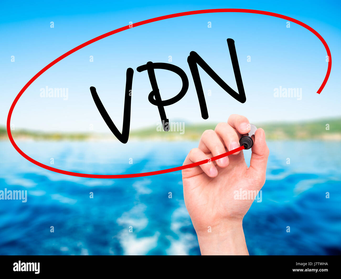 Man Hand writing VPN (Virtual Private Network) with black marker on ...