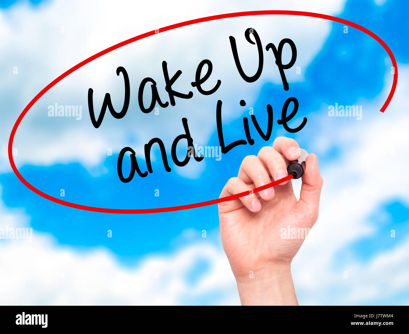 Man Hand writing Wake Up and Live with black marker on visual screen ...