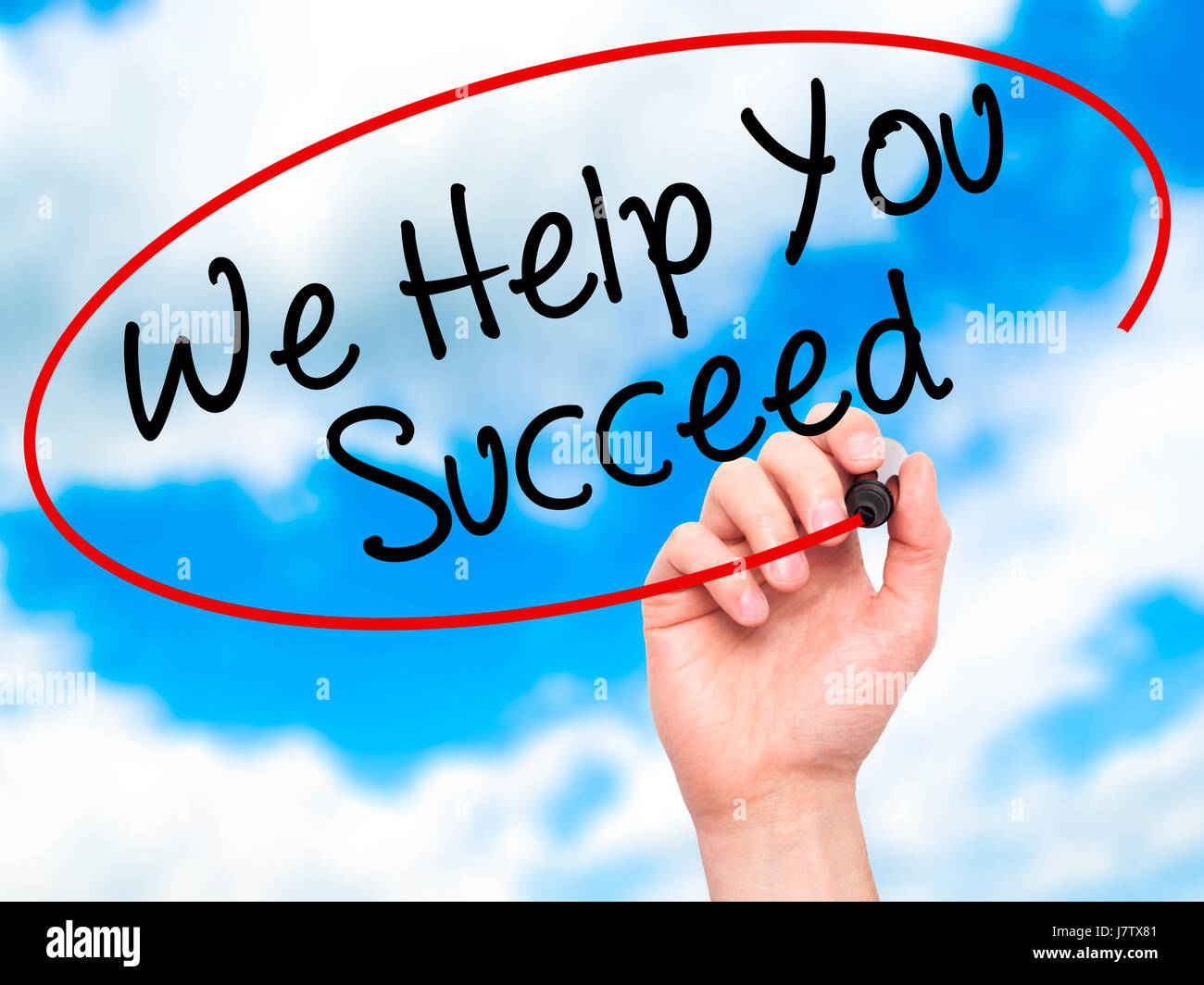 Man Hand writing We Help You Succeed with black marker on visual screen ...