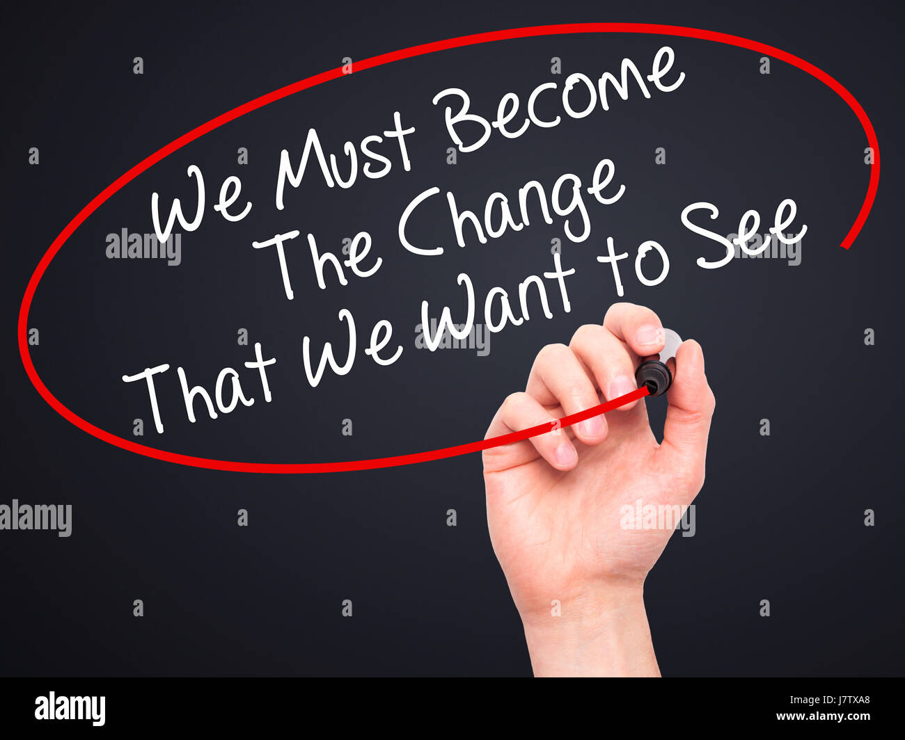 Man Hand writing We Must Become The Change That We Want to See with ...