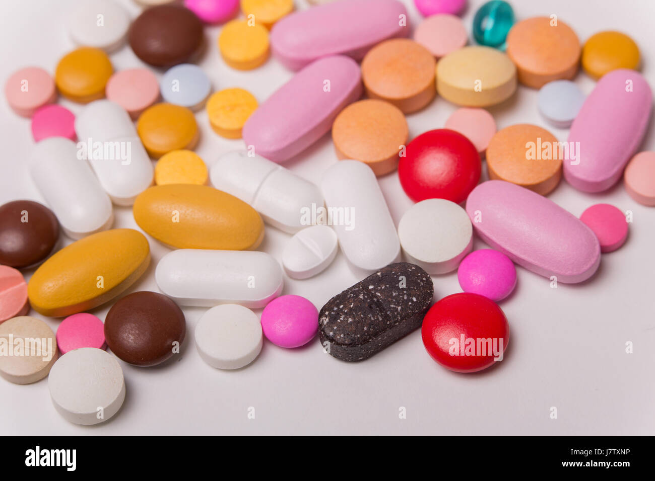 different Tablets pills capsule heap mix therapy drugs Stock Photo - Alamy