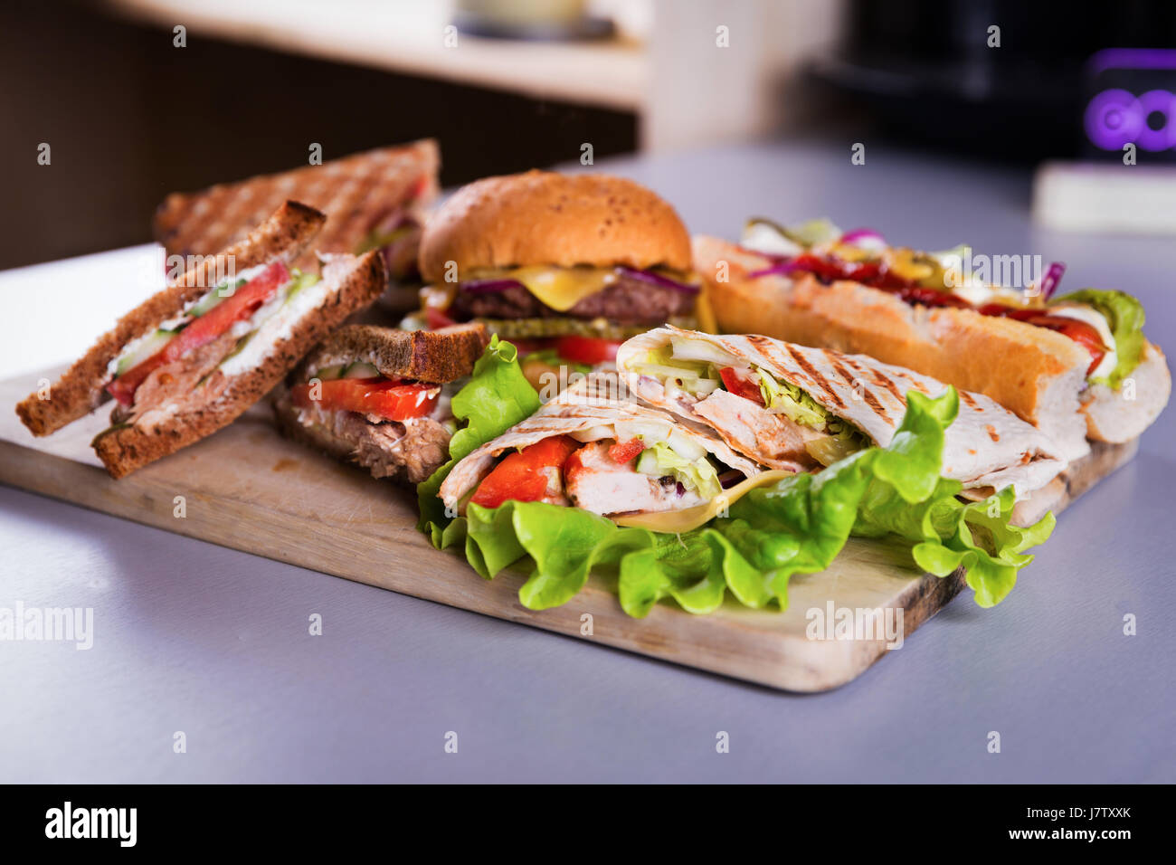 Fast food plate with burger hot dog sandwiches and chicken wrap Stock ...