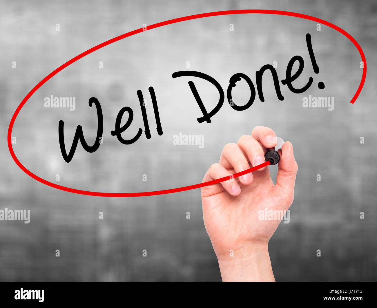 Man Hand writing Well Done! with black marker on visual screen ...