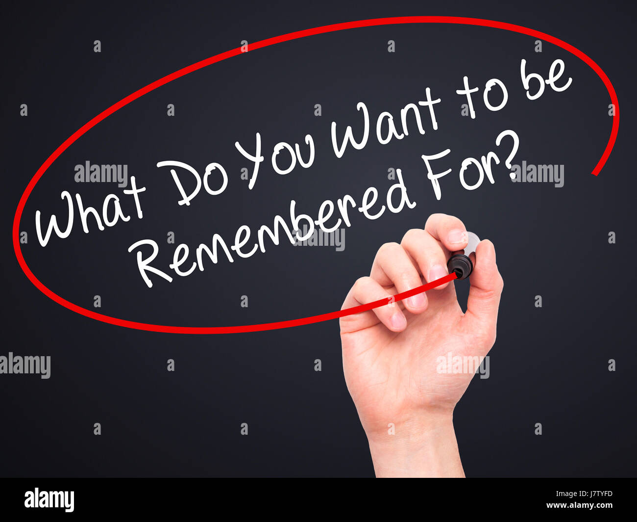 Man Hand writing What Do You Want to be Remembered For? with black ...