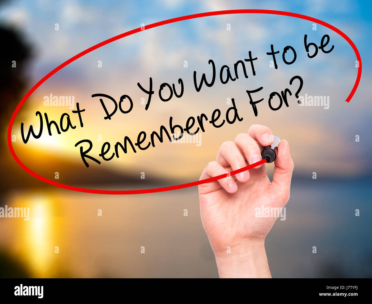 Man Hand writing What Do You Want to be Remembered For? with black ...