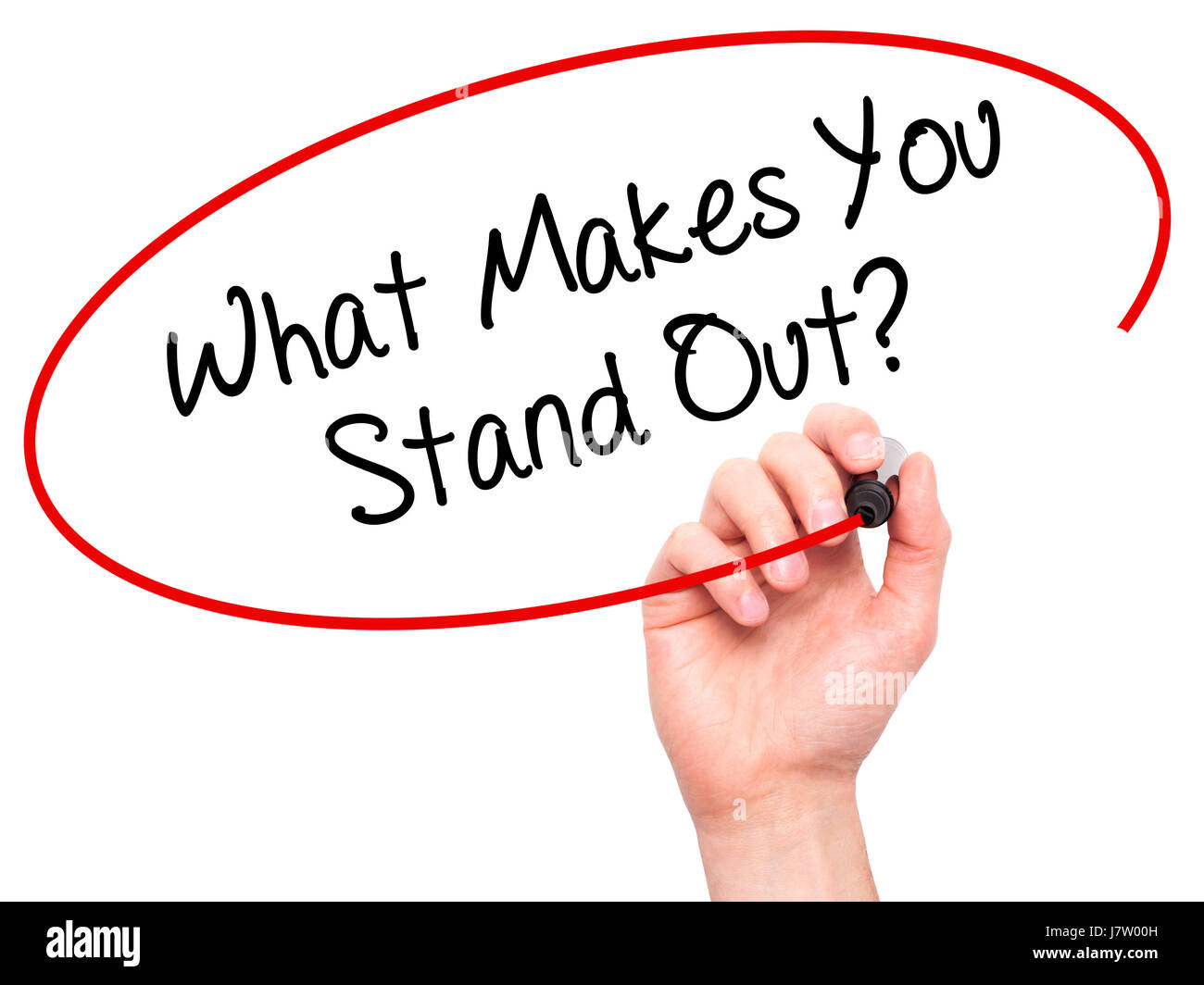Man Hand writing What Makes You Stand Out? with black marker on visual ...