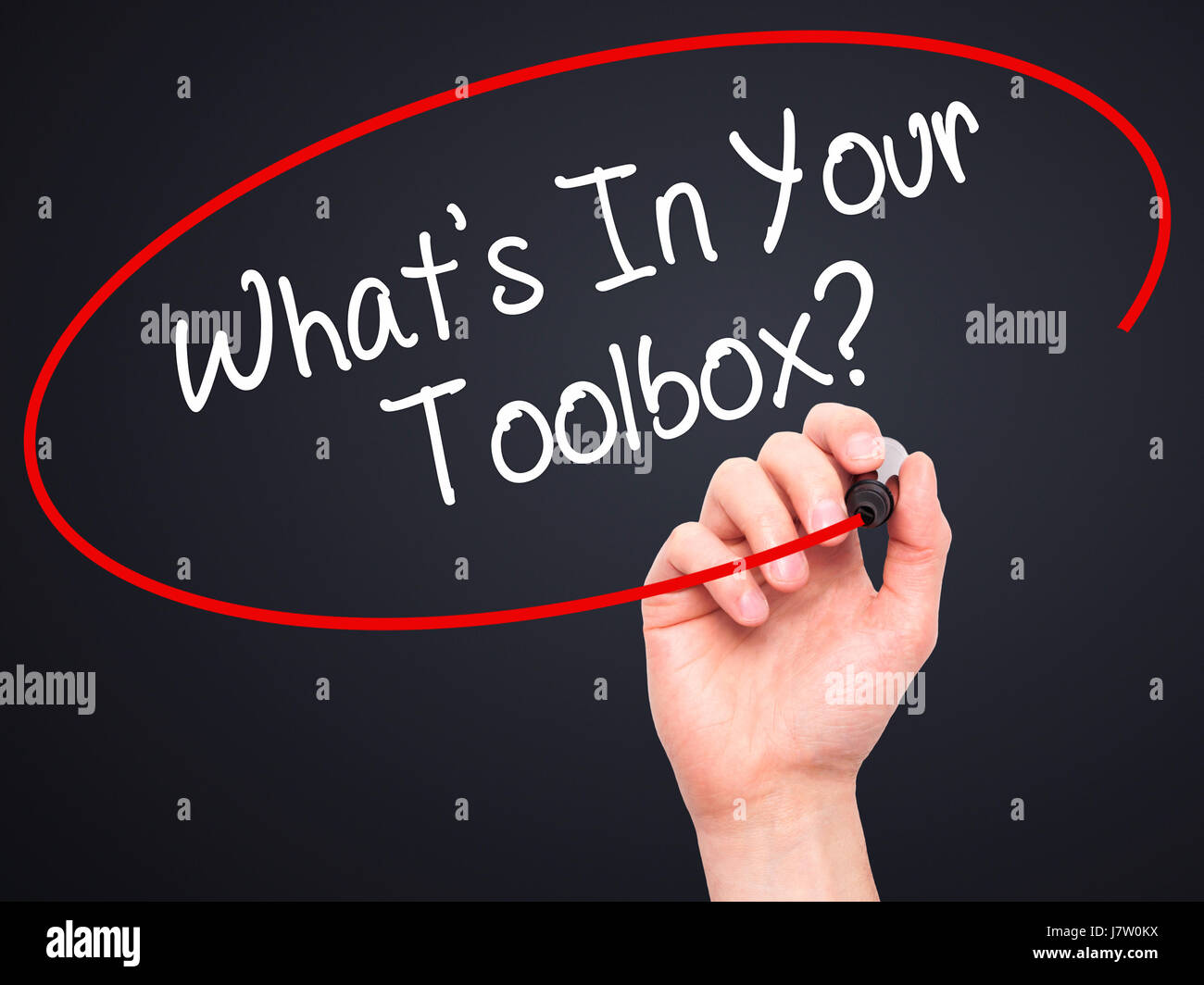 Man Hand writing What's In Your Toolbox? with black marker on visual ...