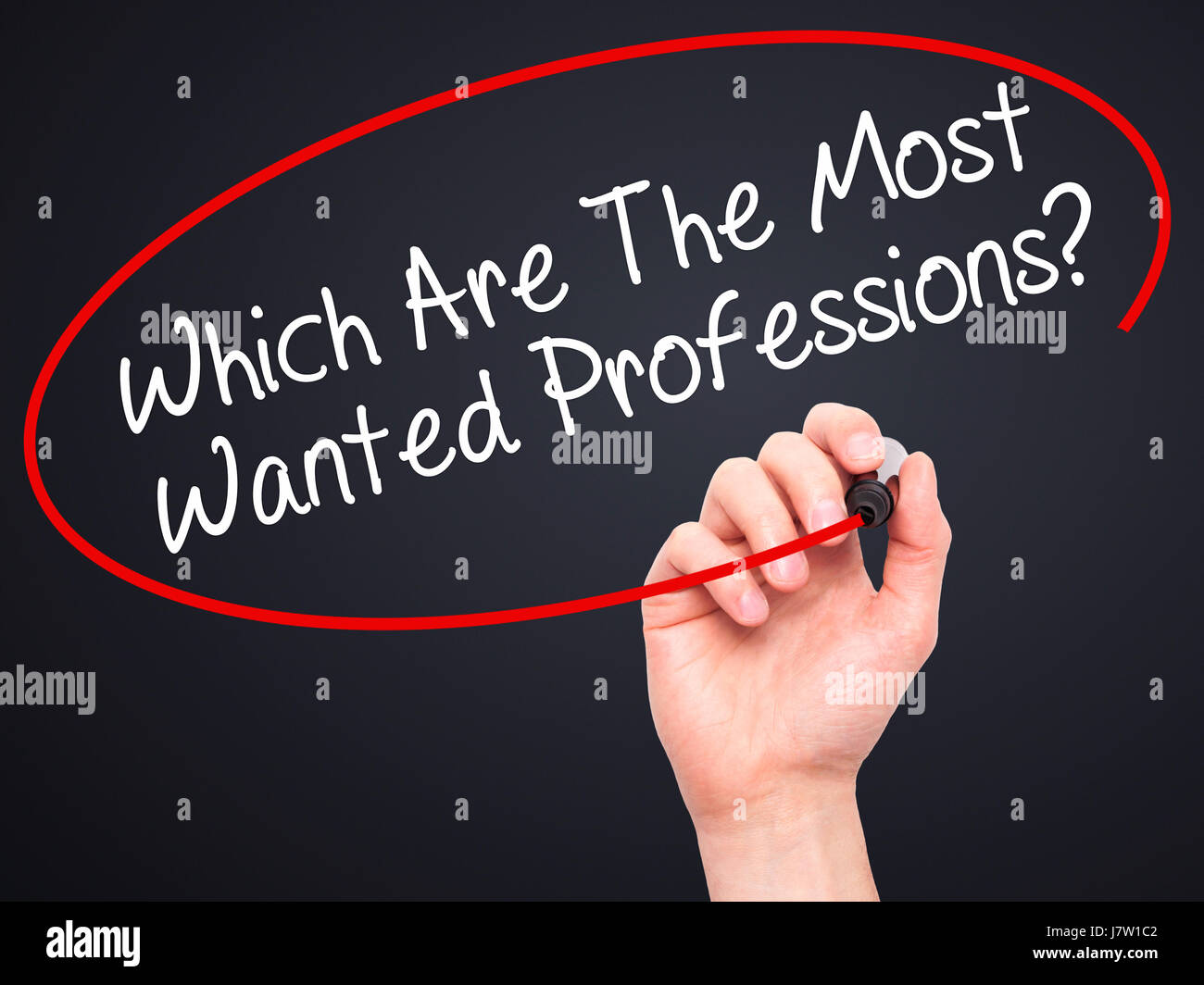Man Hand writing Which Are The Most Wanted Professions? with black ...