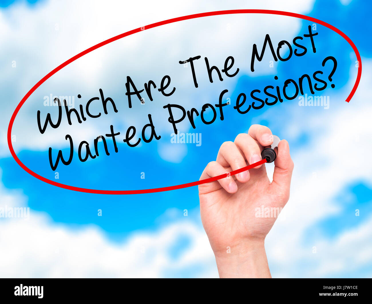 Man Hand writing Which Are The Most Wanted Professions? with black ...
