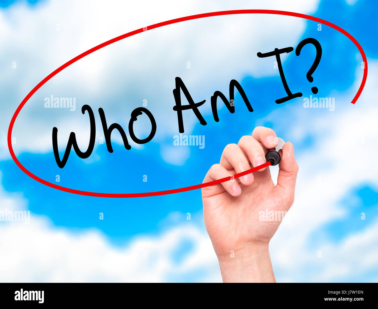 Man Hand writing Who Am I? with black marker on visual screen. Isolated ...