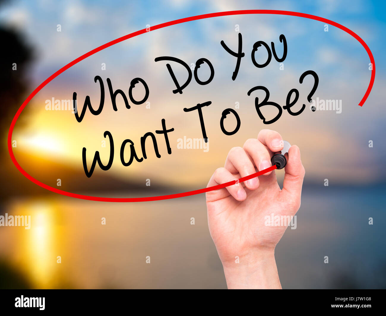 Man Hand writing Who Do You Want To Be? with black marker on visual ...