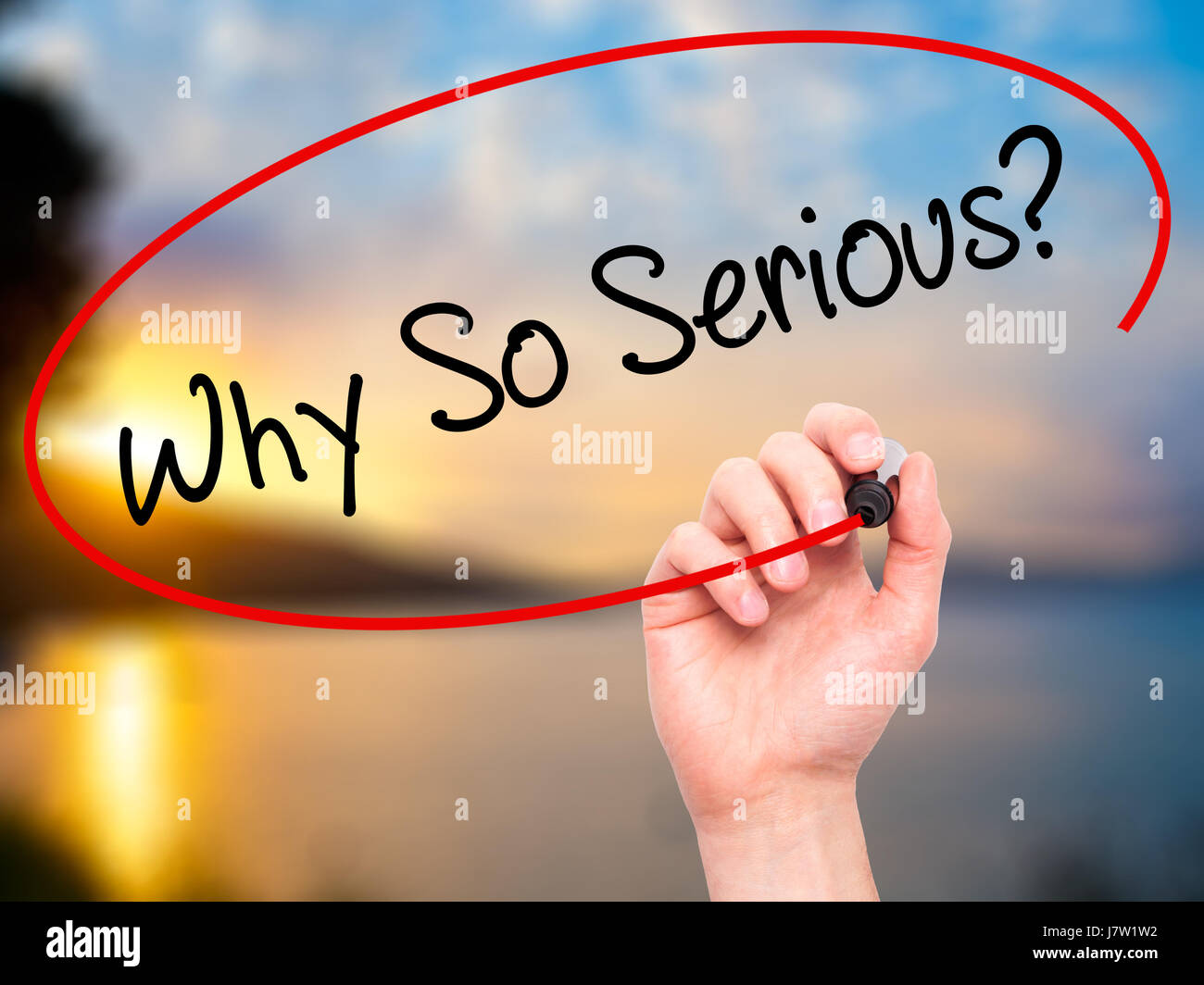 Man Hand writing Why So Serious? with black marker on visual screen ...