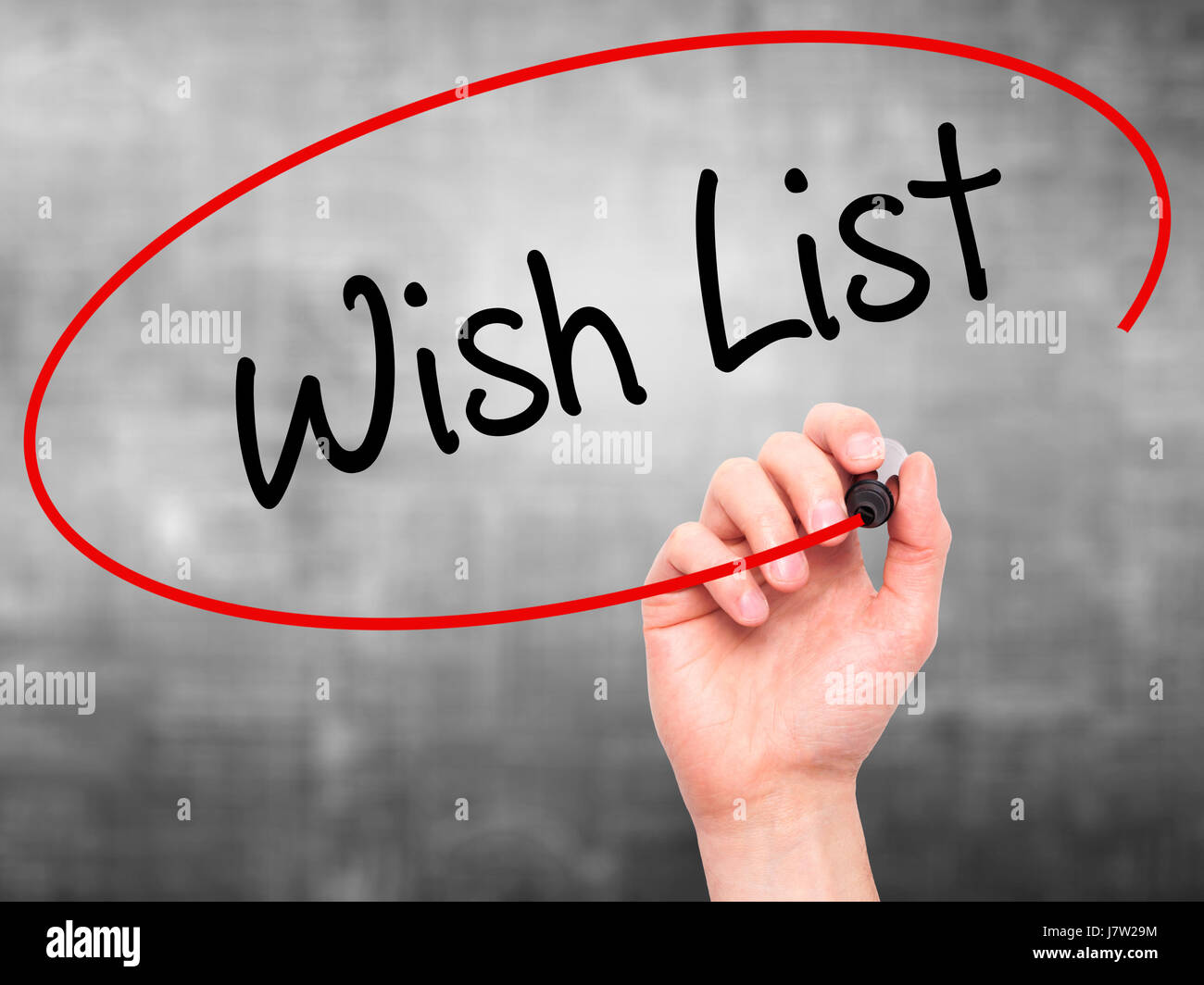 Man Hand writing Wish List with black marker on visual screen. Isolated ...
