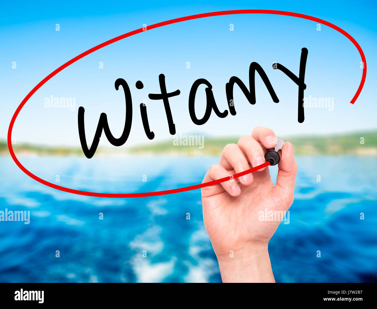 Man Hand writing Witamy (Welcome in Polish) with black marker on visual ...