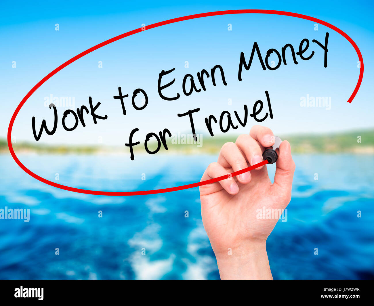 Man Hand writing Work to Earn Money for Travel with black marker on ...
